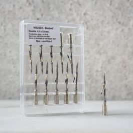 Injection needle, barb
